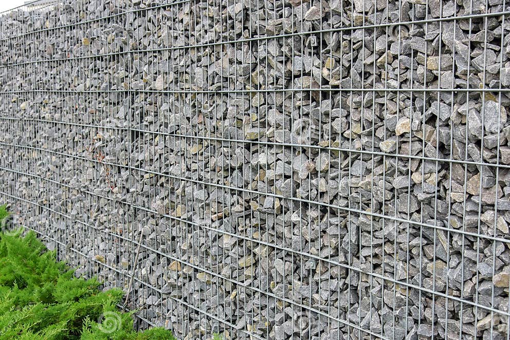 Gabion stone fence stock image. Image of grass, brick - 201190437