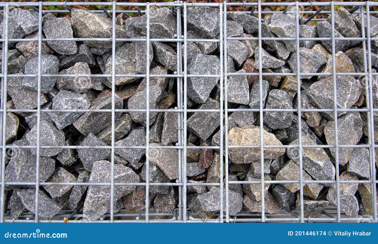 Gabion, A Stone Wall With A Metal Grid Of Gray Granite Texture Stock ...
