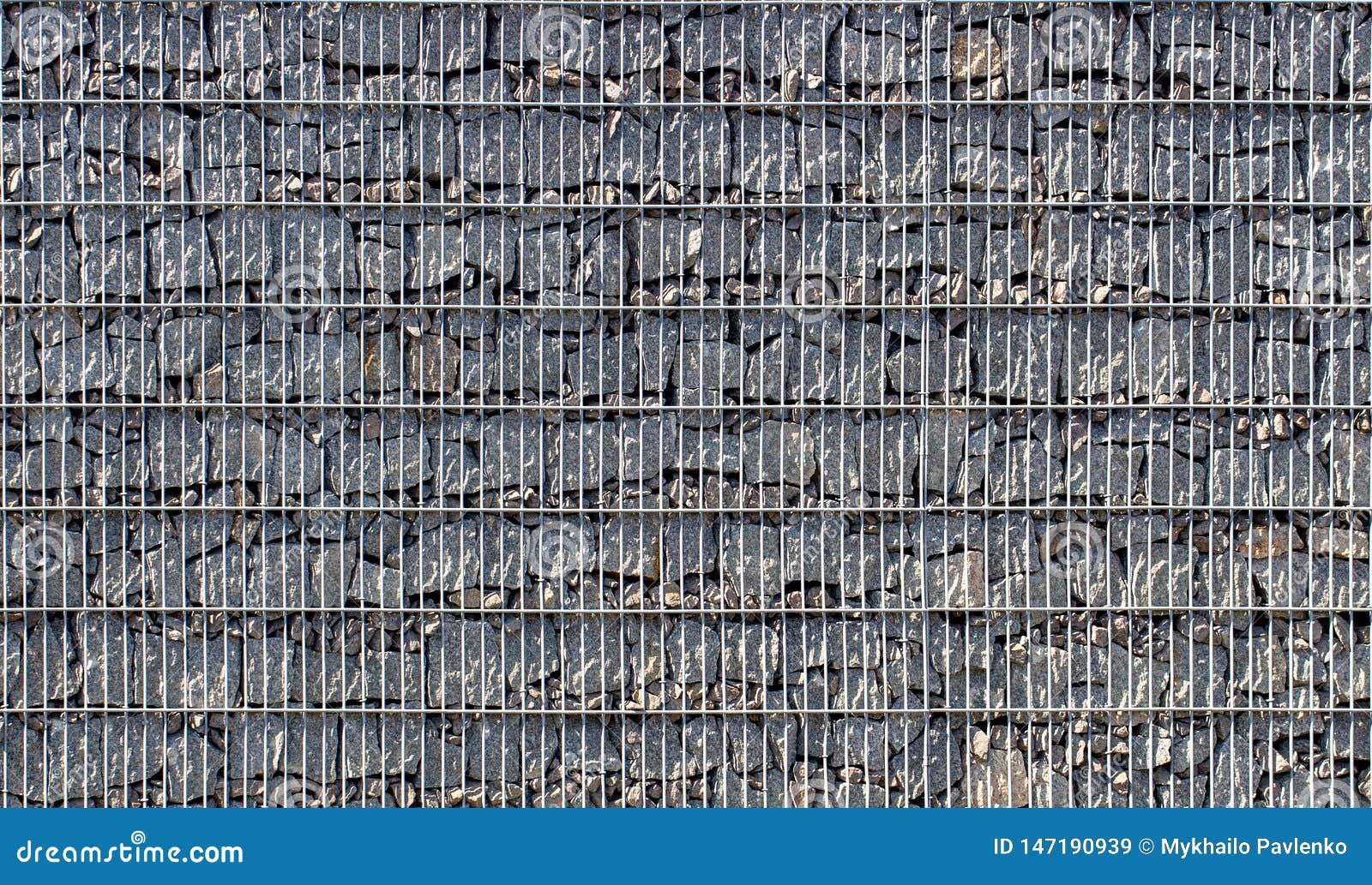Gabion, A Stone Wall With A Metal Grid Of Gray Granite Texture Stock ...