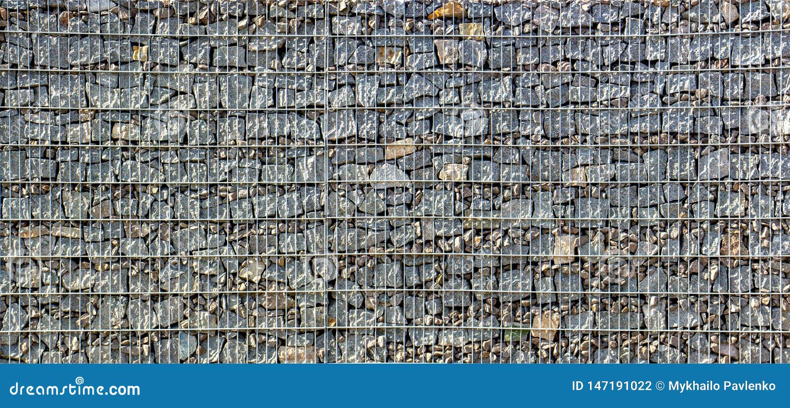 Gabion, a Stone Wall with a Metal Grid of Gray Granite Texture Stock ...