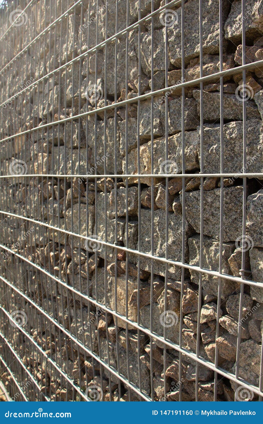 Gabion, A Stone Wall With A Metal Grid Of Gray Granite Texture Stock ...