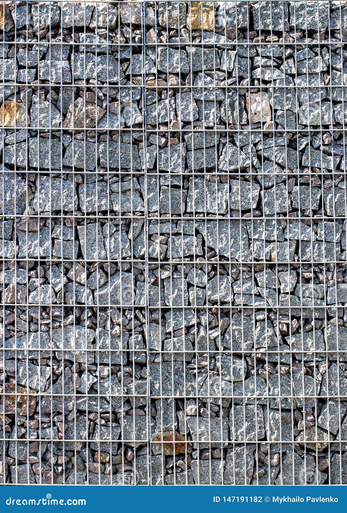 Gabion, A Stone Wall With A Metal Grid Of Gray Granite Texture Stock ...