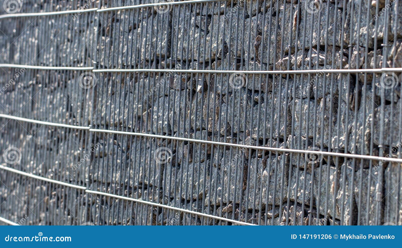 Gabion, a Stone Wall with a Metal Grid of Gray Granite Texture Stock ...