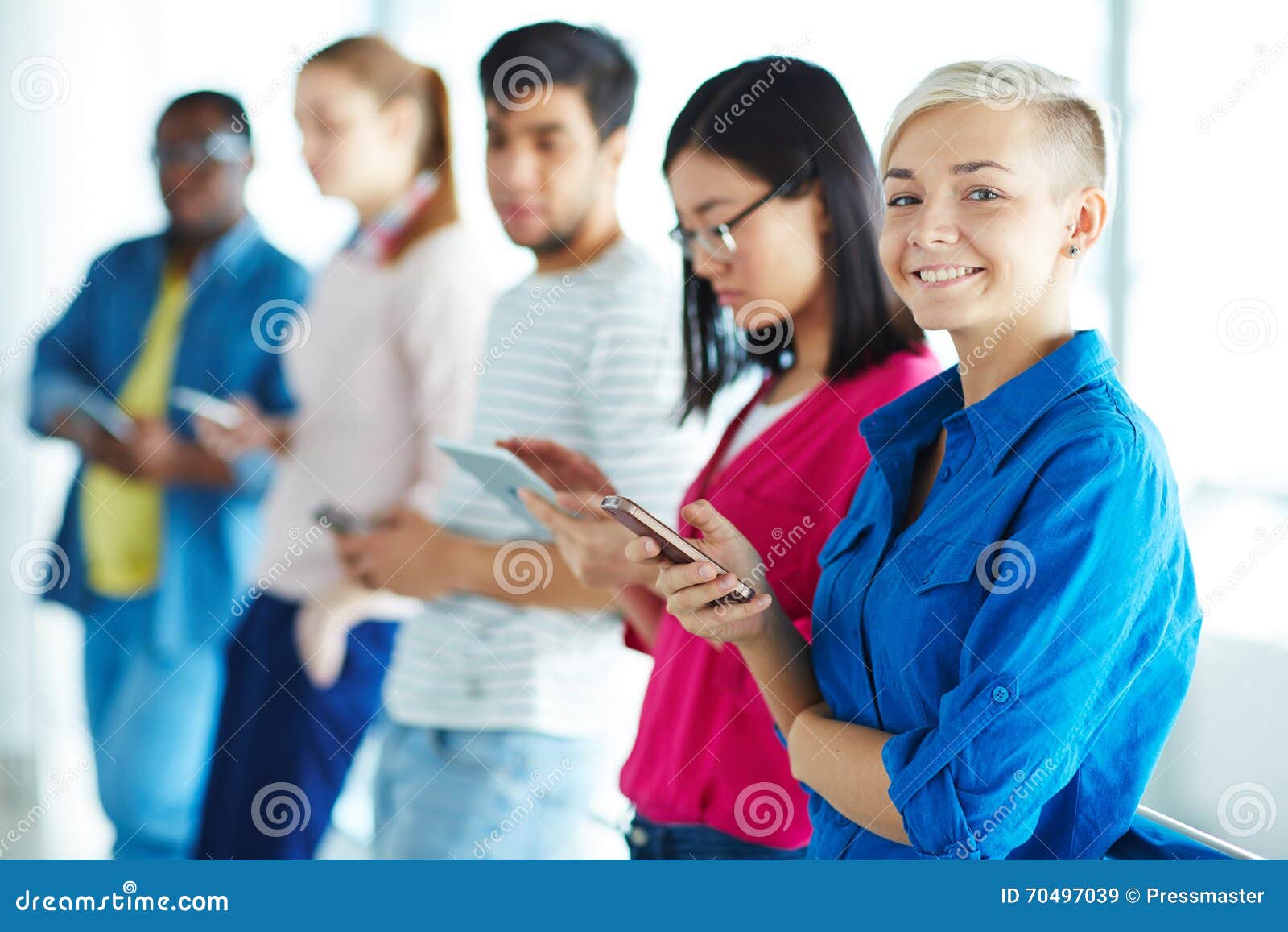 Gadget addiction stock image. Image of smiling, people - 70497039