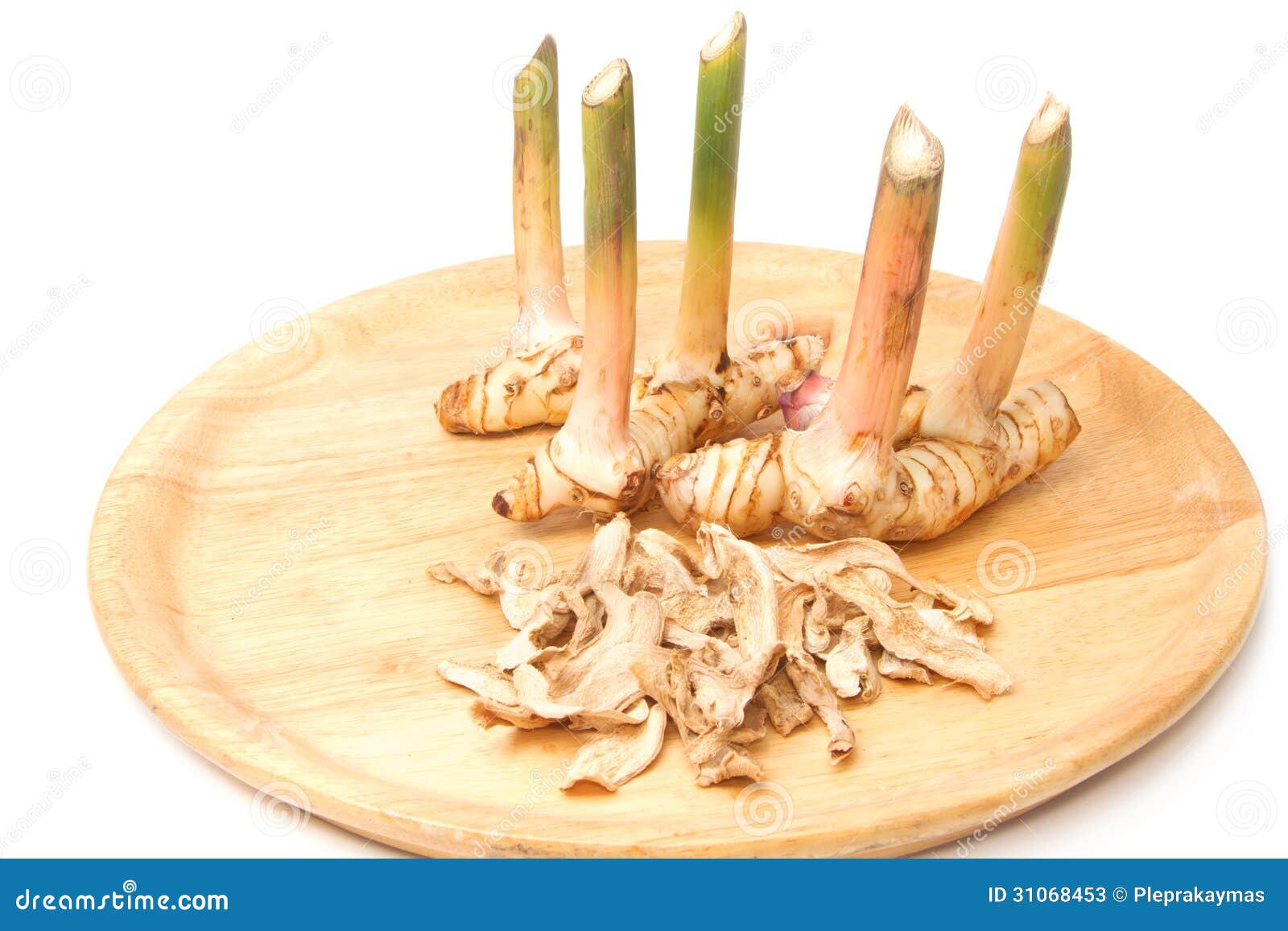 Galangal Root And Galanga Powder In Wooden Spoon On Rustic Table ...