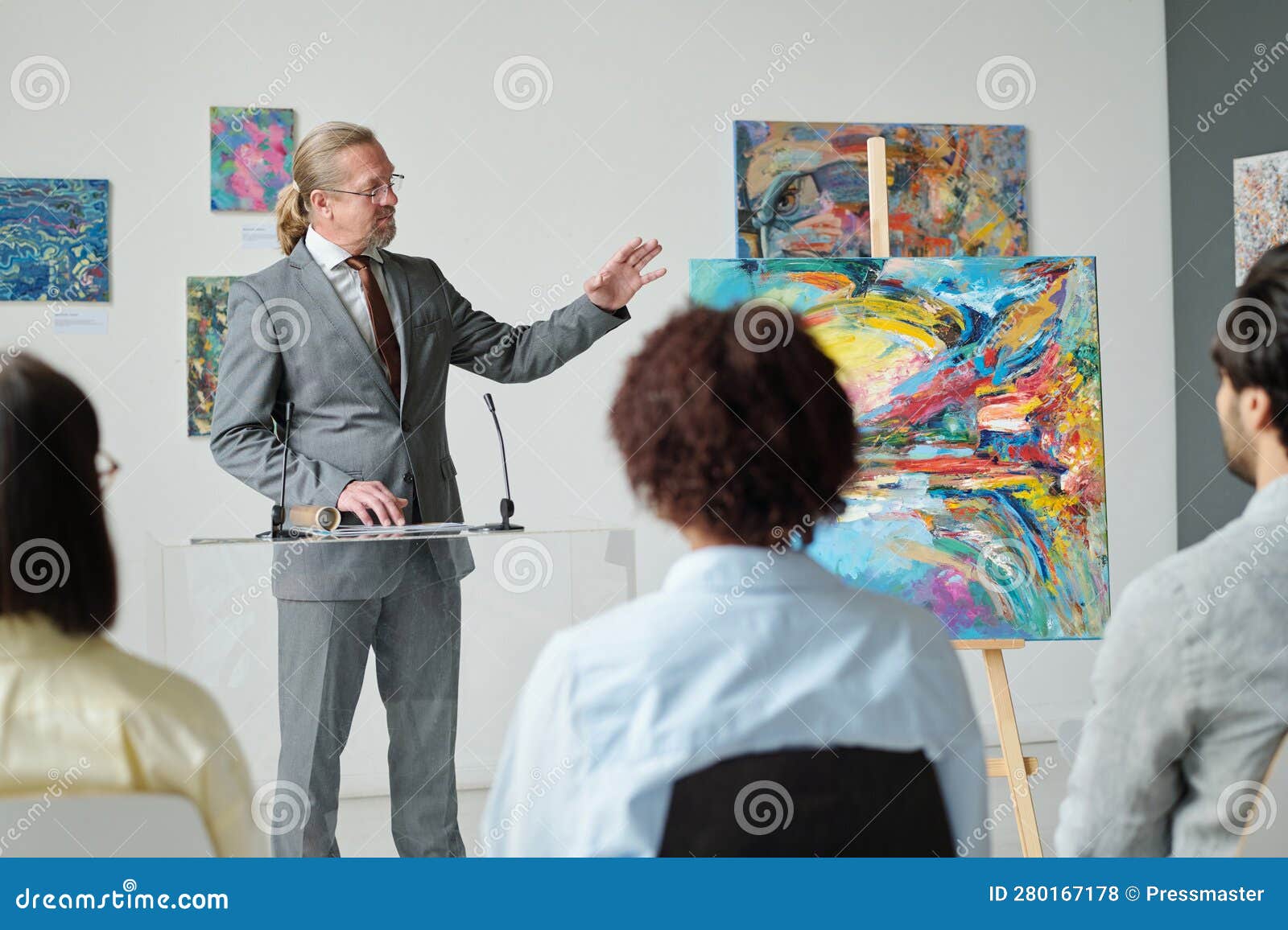 Gallery Owner Presenting the Modern Art Stock Photo - Image of ...