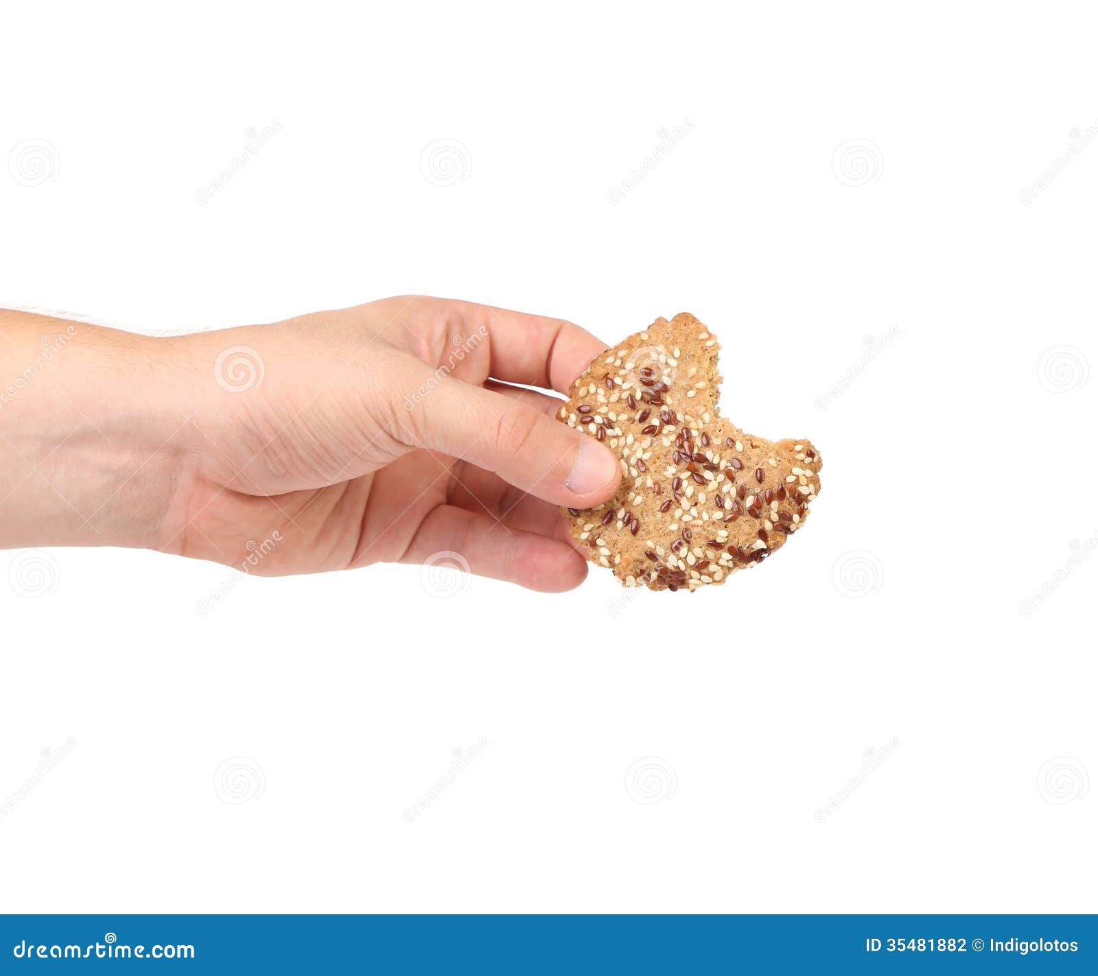 Galleta Mordida Controles De La Mano. Foto de archivo - Imagen de ...