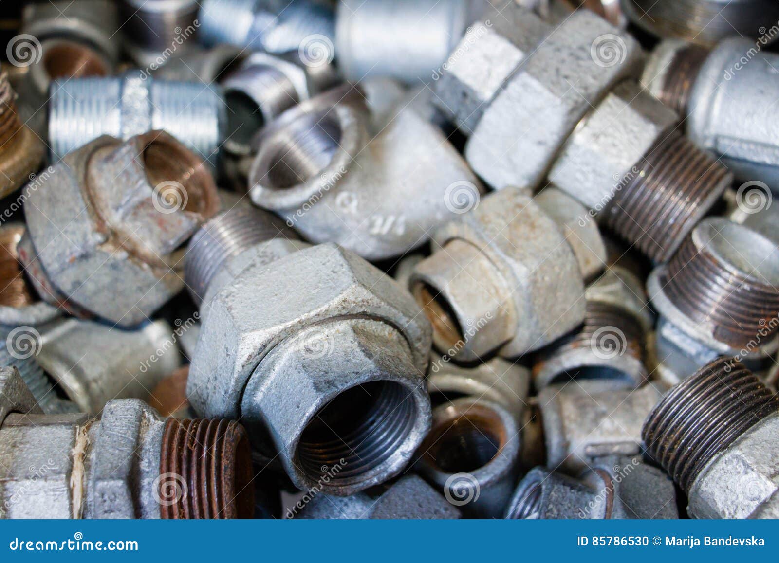 Galvanized fittings stock photo. Image of people, installing - 85786530