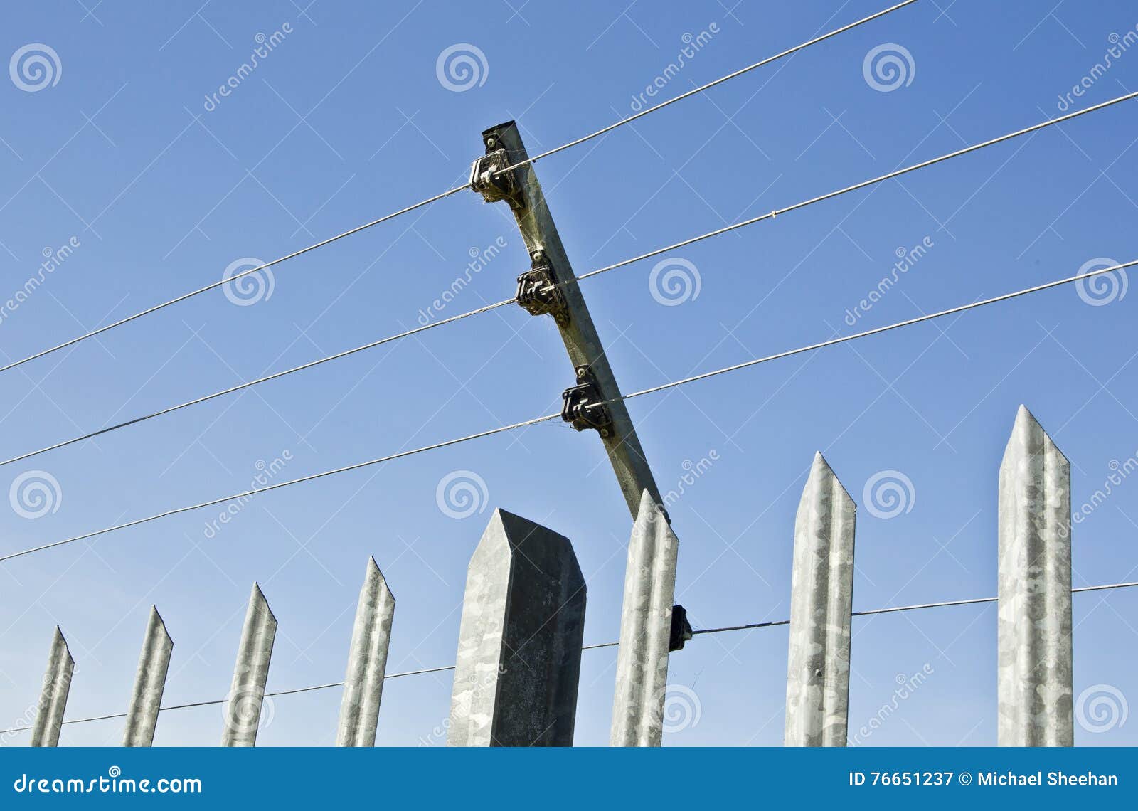 Galvanized Poles Holding a High Voltage Security Fence Stock Image ...