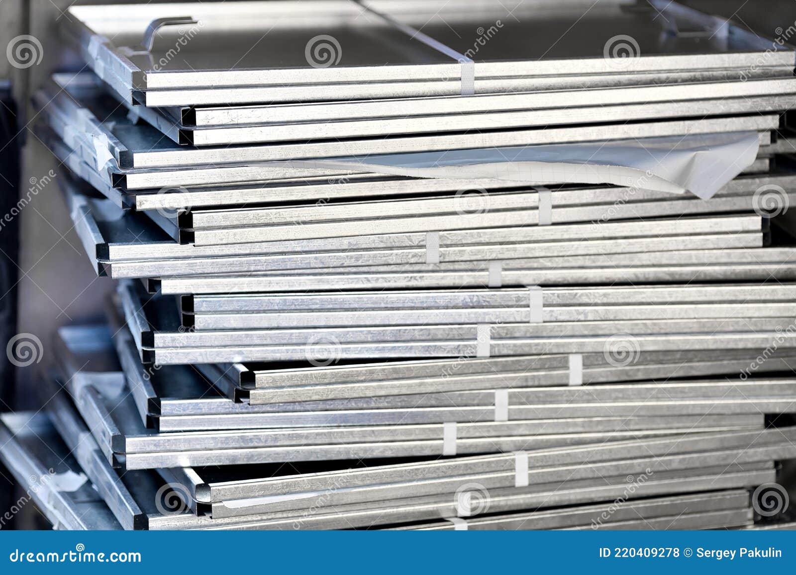 Galvanized Sheets are Stacked in a Stack. Industrial Background Stock ...
