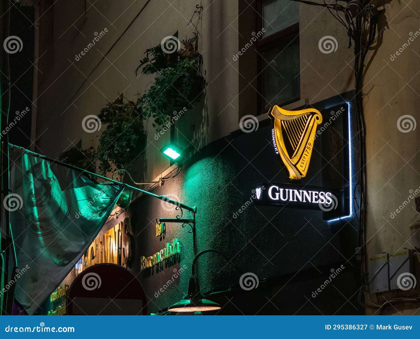 Guinness Sign Text And Logo Of Irish Beer On Restaurant Pub Bar Facade ...