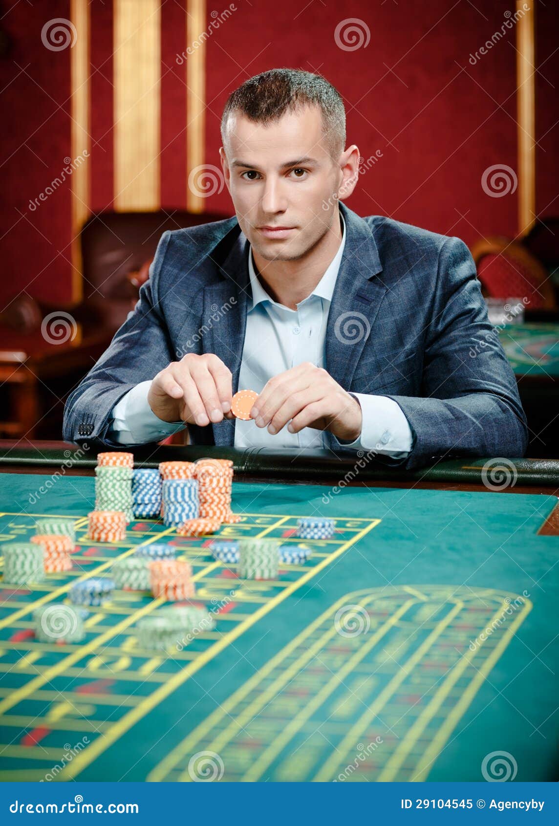 Gambler Playing Roulette at the Casino Table Stock Image - Image of ...