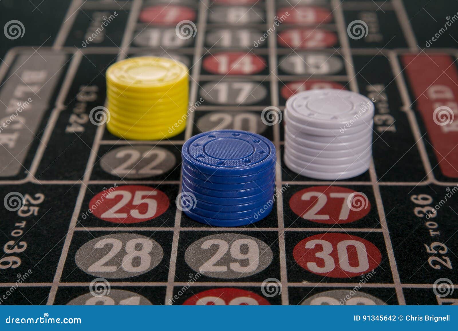 Gambling on a Roulette Table with Different Chips Stock Photo - Image ...