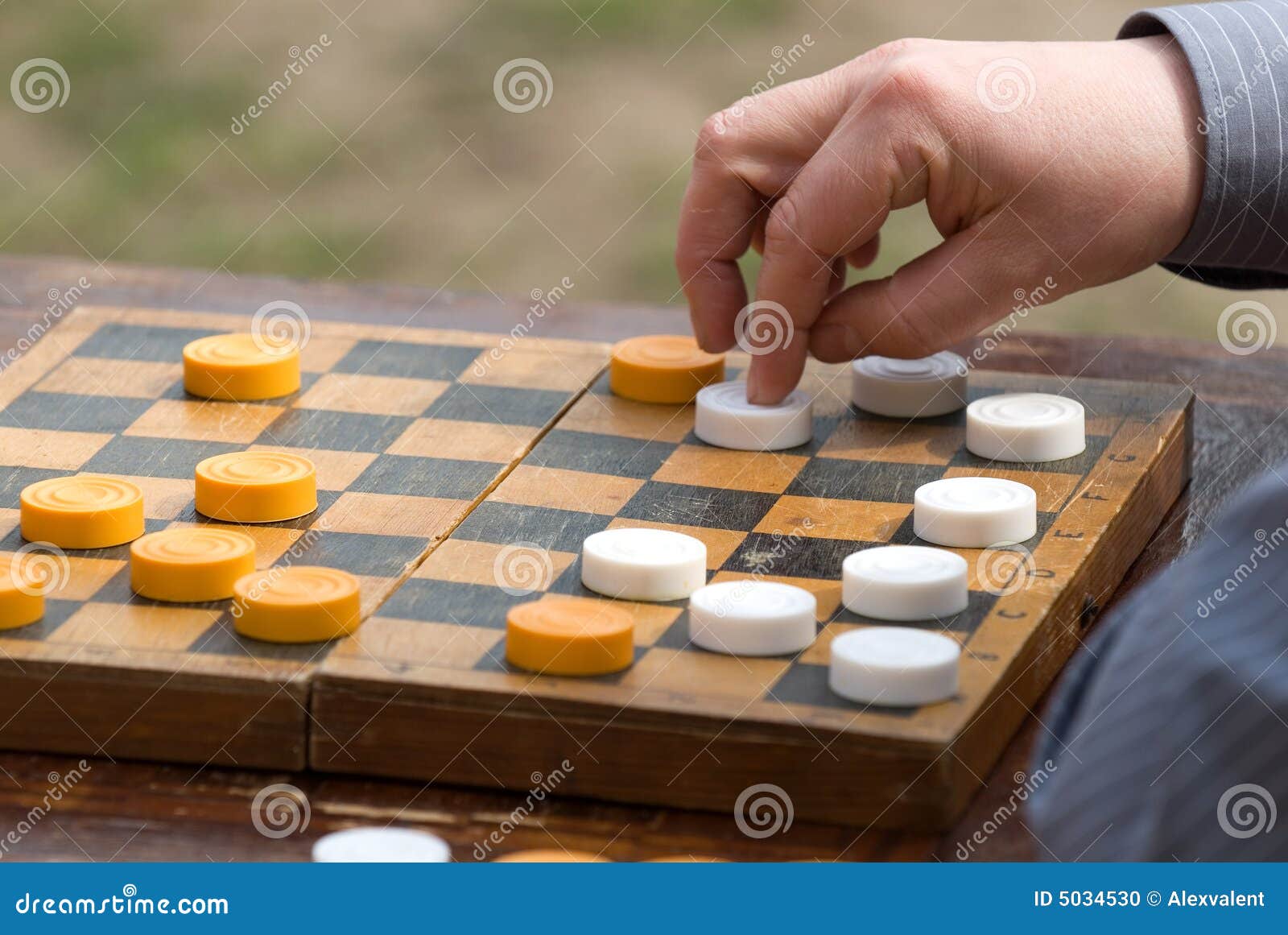 Game in checkers stock photo. Image of hand, concept, pieces - 5034530