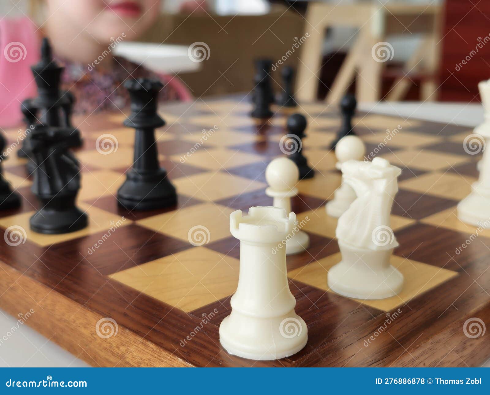 A Game on a Chess Board with Black and White Pieces Stock Photo - Image ...
