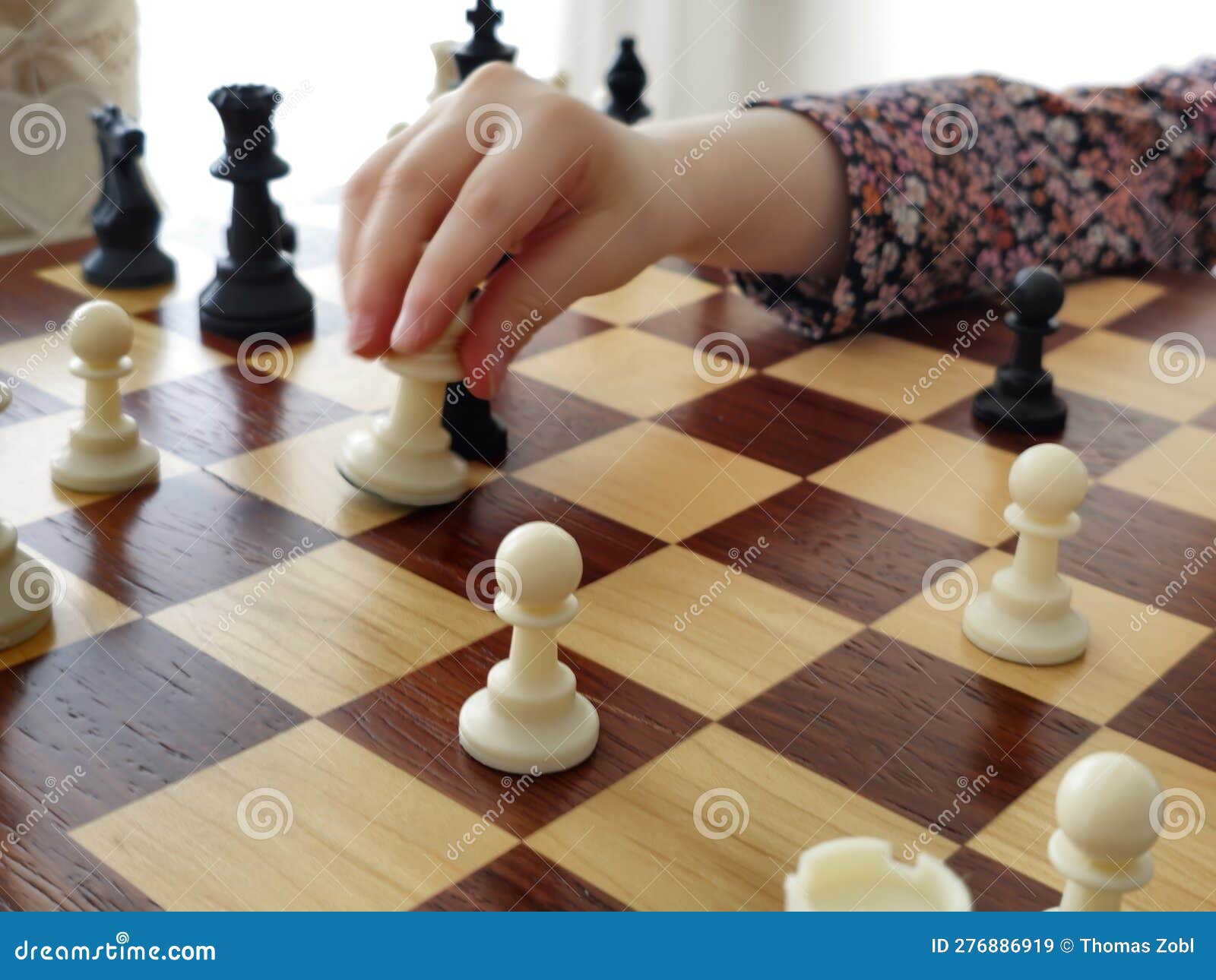 A Game on a Chess Board with Black and White Pieces Stock Image - Image ...