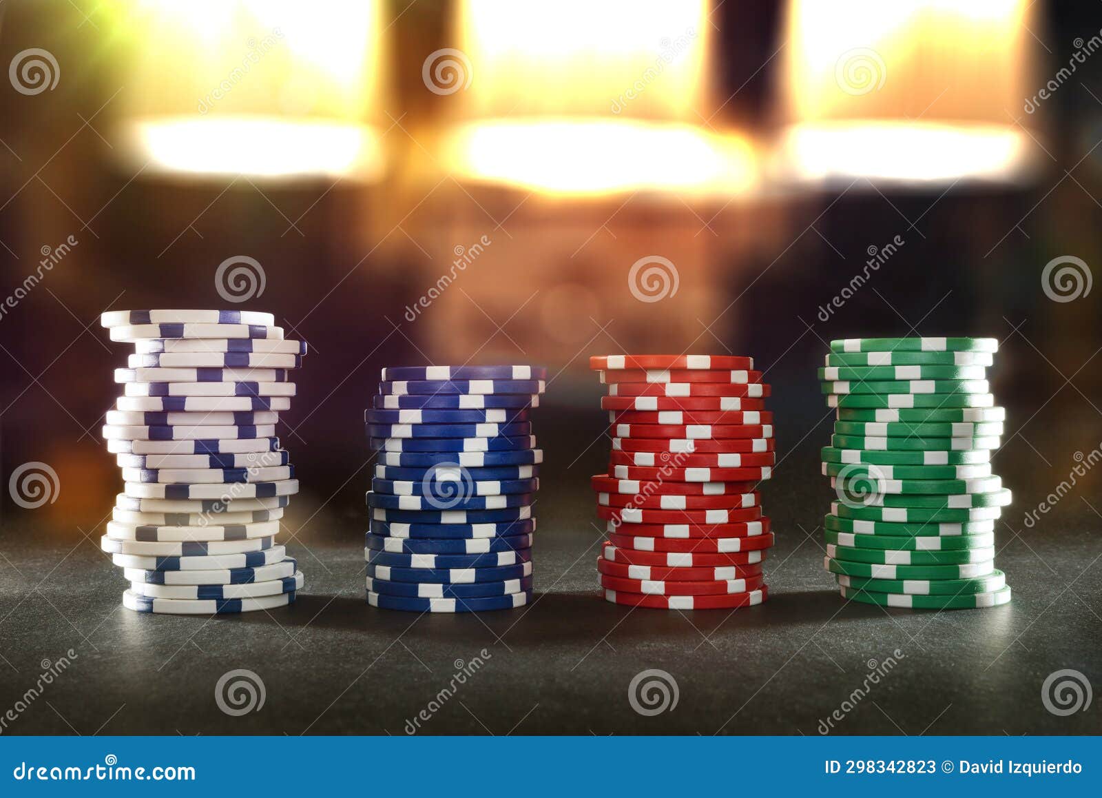 Game Chips on Black Table and Game Room Background Stock Image - Image ...