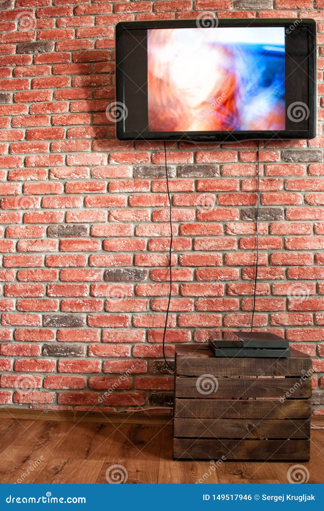Game Console on a Vegetable Box Against a Brick Wall Stock Photo ...