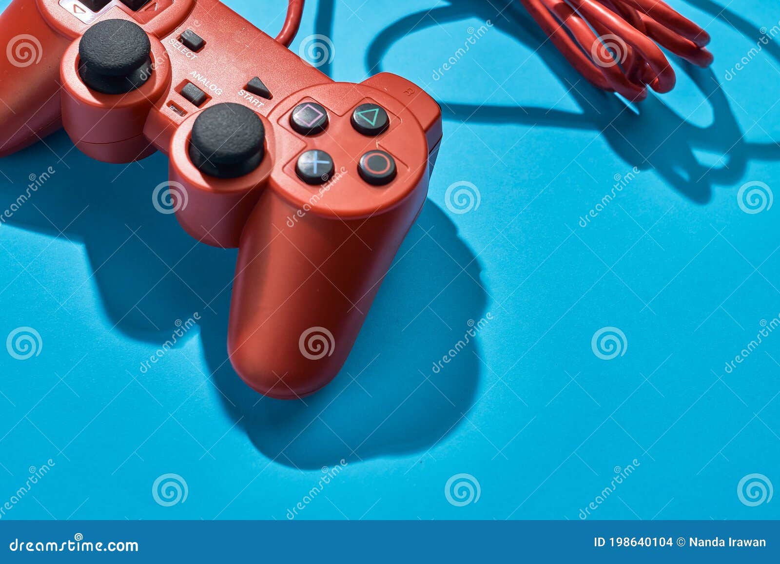 Game Controller on Blue Background Top View Stock Photo - Image of ...