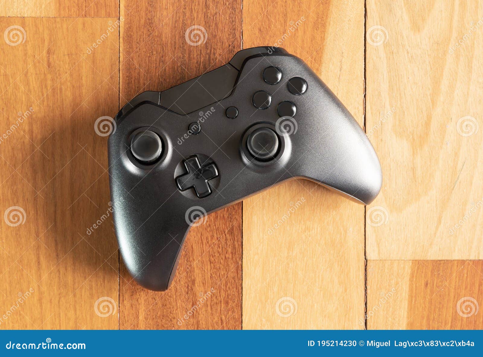 Game Controller on Wooden Floor Stock Photo - Image of videogame ...