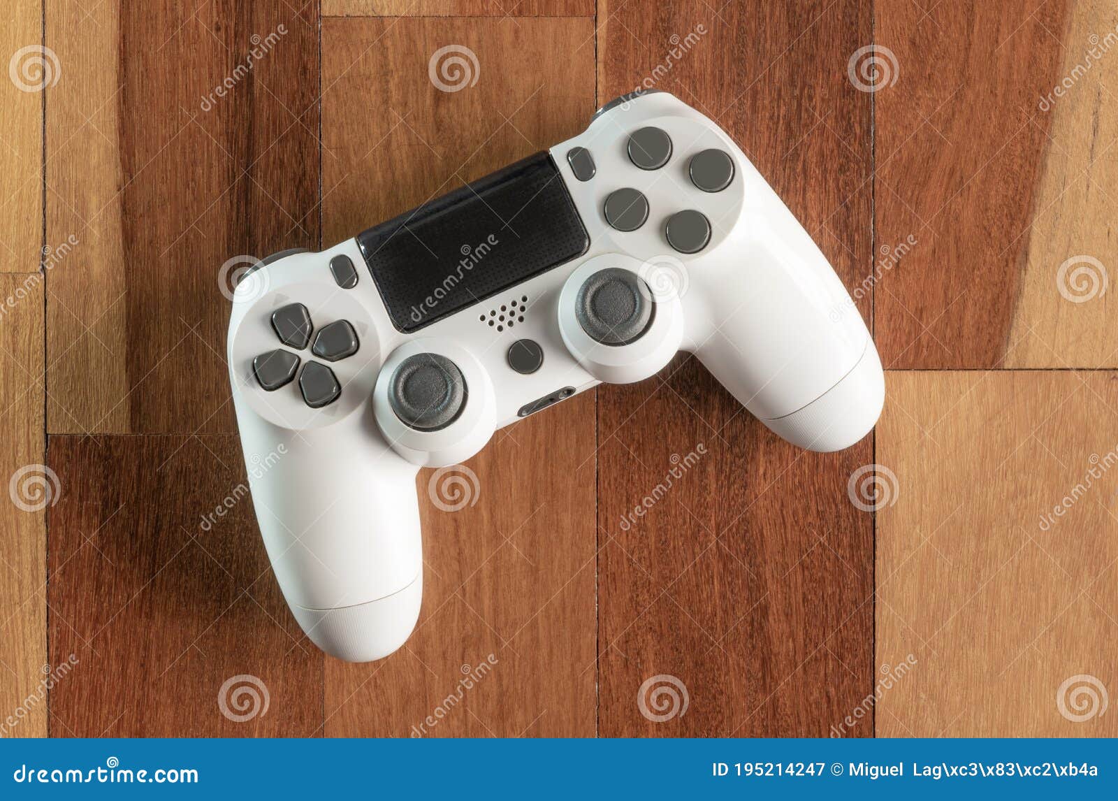 Game Controller on Wooden Floor Stock Image - Image of wireless, keypad ...