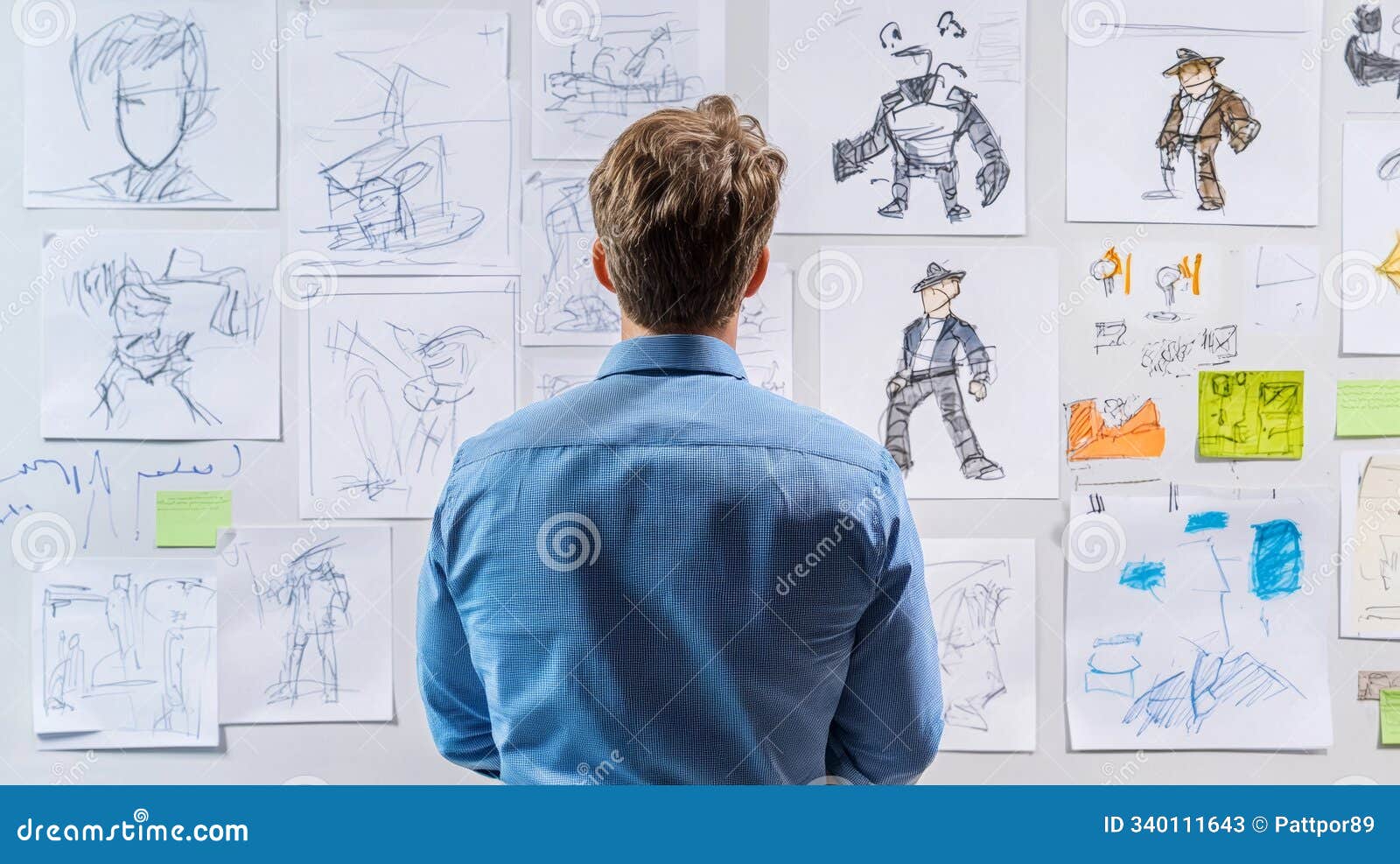 Game Developer Reviewing Character Blueprints and Outlines Stock ...