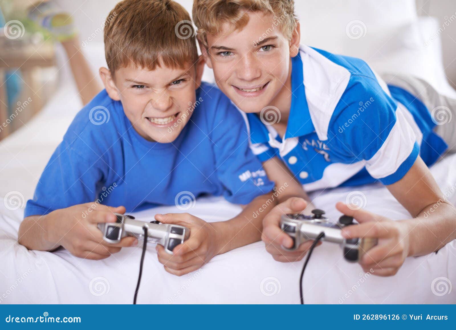 This Game Just Got Interesting. Two Brothers Playing Video Games. Stock ... This Game Just Got Interesting. Two Brothers Playing Video Games. Stock ...