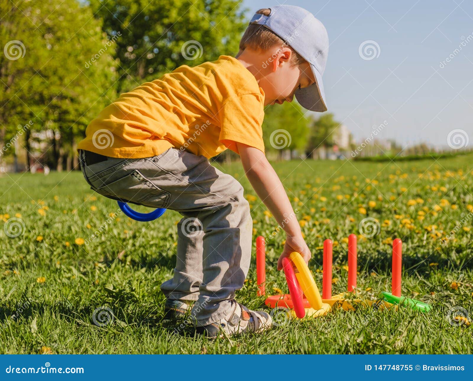 Game Kid Boy Fun Grass. Toy Stock Image - Image of child, friend: 147748755