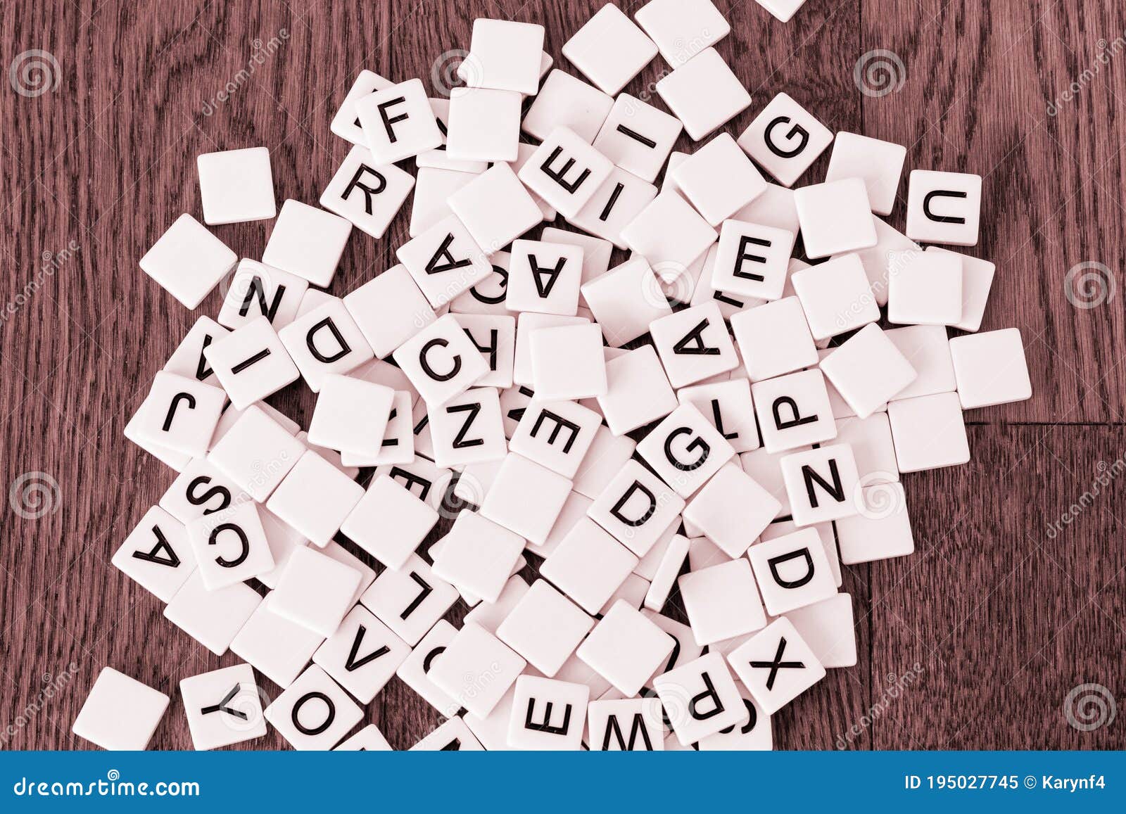 Game Tiles with Letters Dumped Onto a Table Stock Image - Image of ...