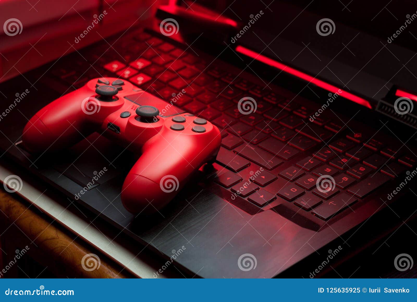 Gamepad on Computer Keyboard in the Dark. Video Game Controllers Stock ...