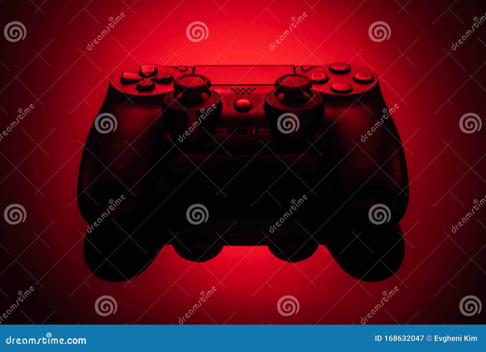 Gamepad Game Console on a Red Background Editorial Photography - Image ...