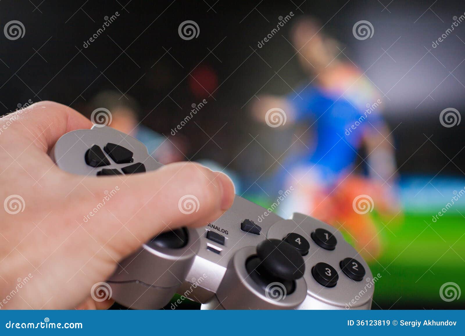 Gamepad in hand stock image. Image of playing, monitor - 36123819