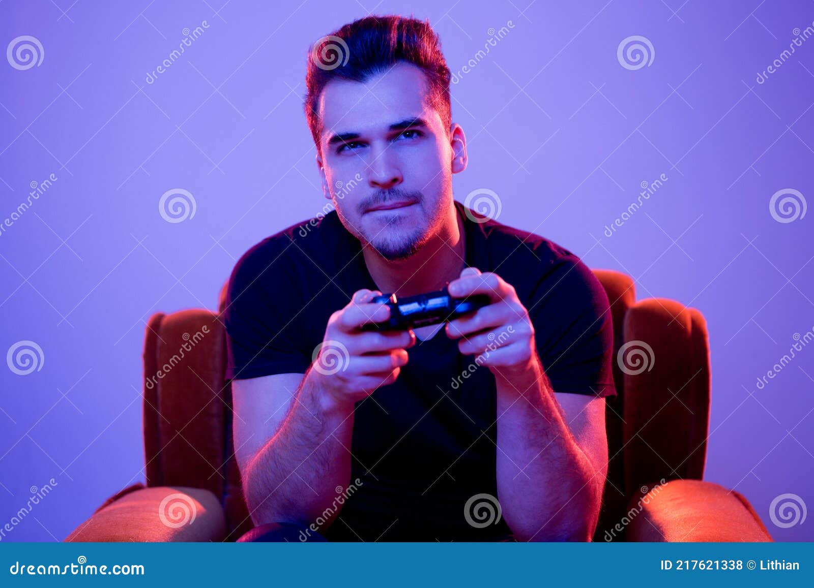 Gamer all ready for battle stock photo. Image of sitting - 217621338