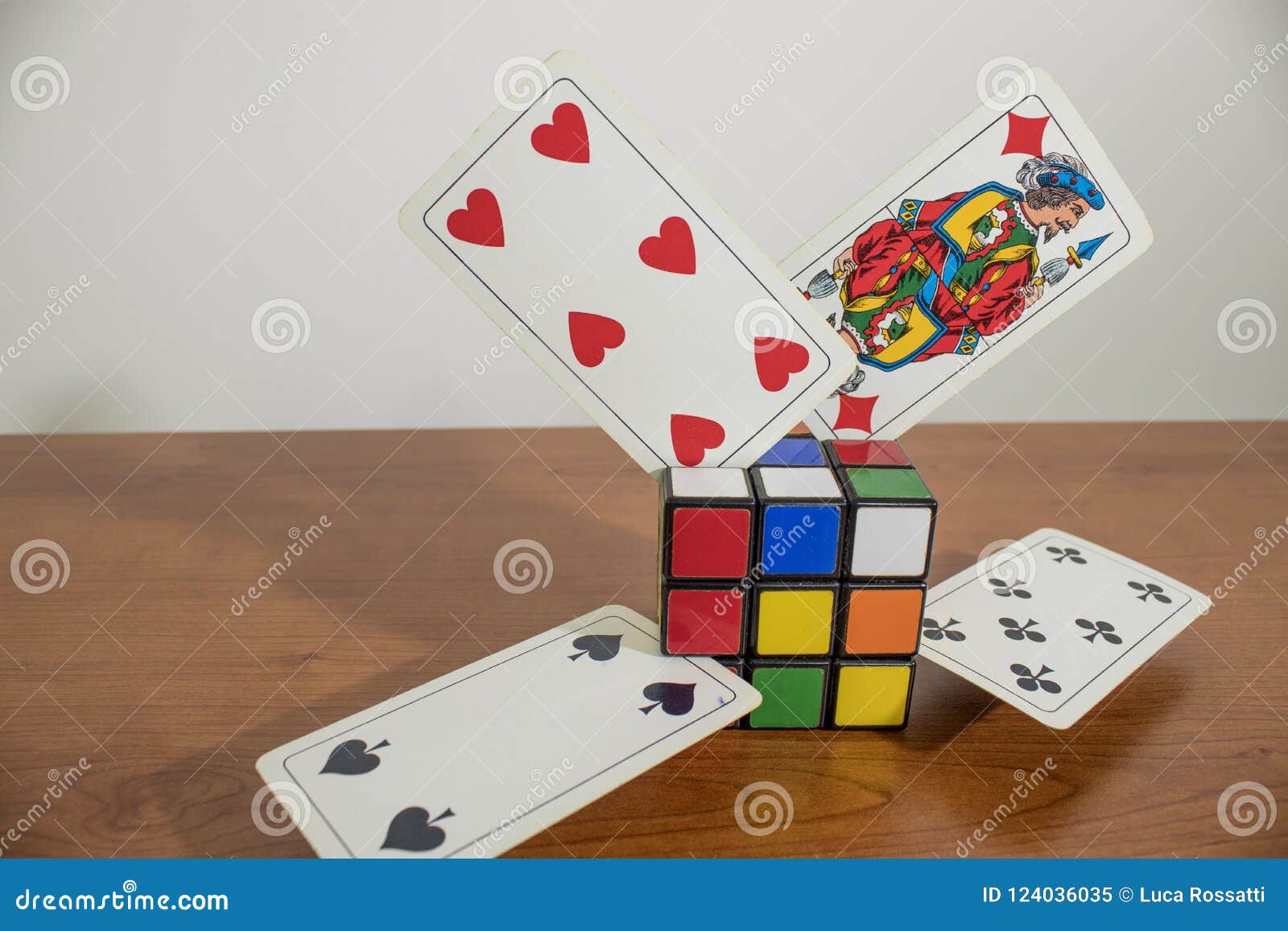 Games Composition, Rubik Cube Full of Gaming Cards Editorial Image ...