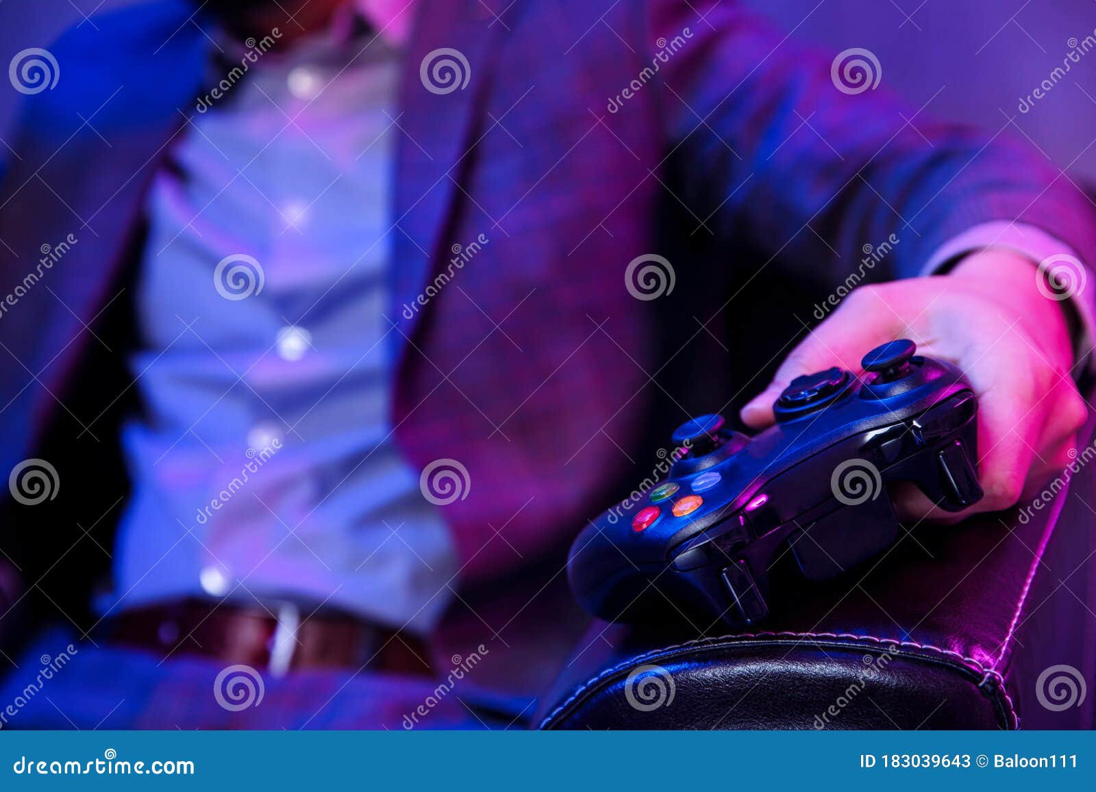 Gaming controller in hand stock image. Image of earning - 183039643