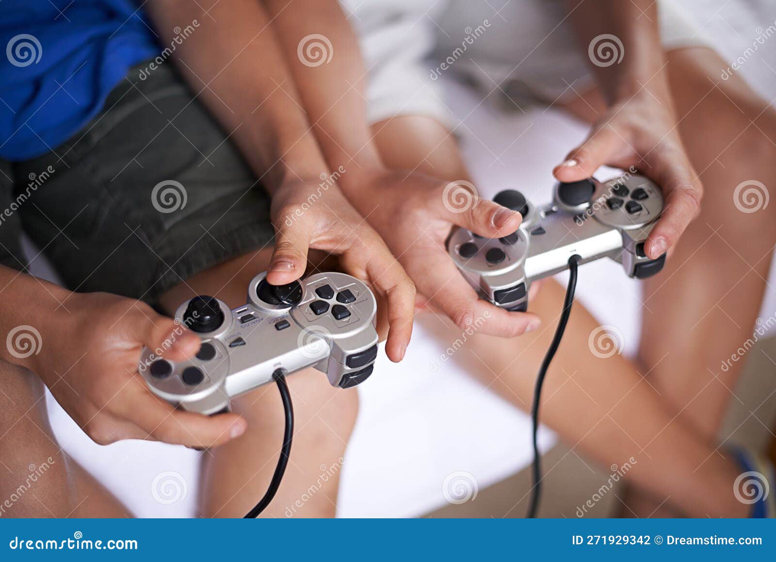 Gaming with a Friend. Two Young Boys Playing Video Games. Stock Photo ...