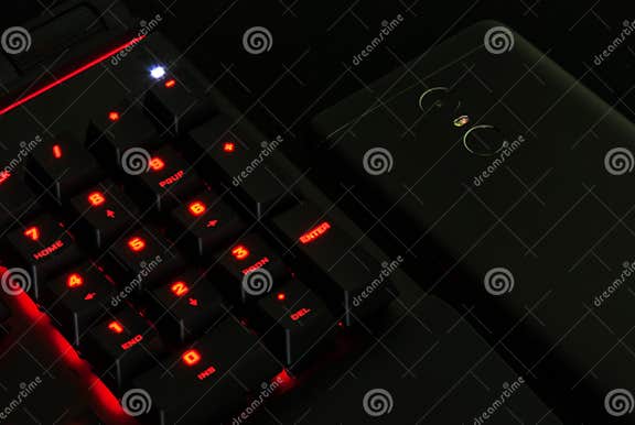 Gaming Keyboard with Lights and Phone Stock Photo - Image of ...