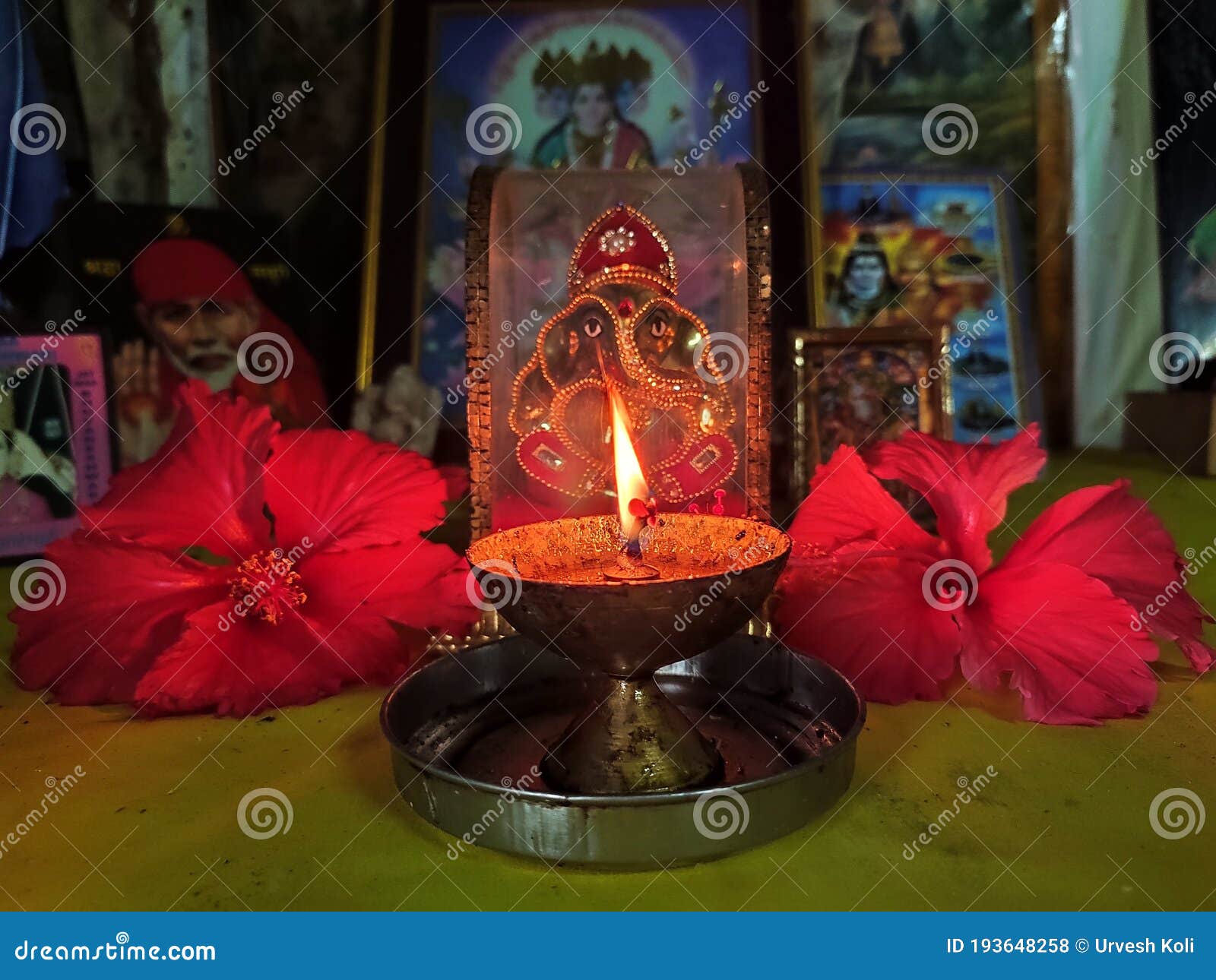 Ganesh Idol with Lamp, Ganpati Sthapana at Home in Lockdown Stock Photo ...