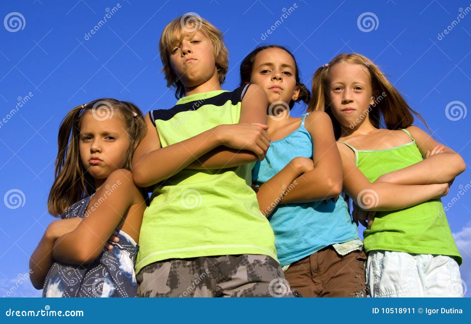 Gang of four serious kids stock image. Image of serious - 10518911