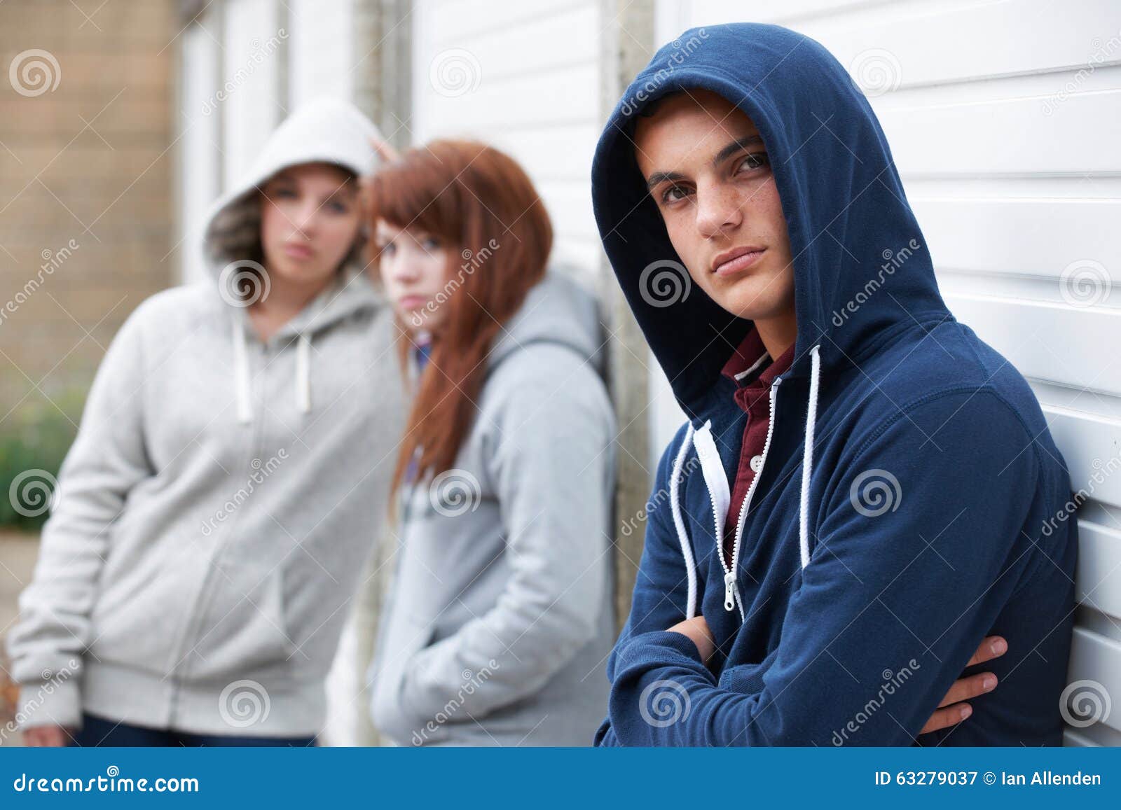 Gang of Teenagers Hanging Out Stock Image - Image of boredom, three ...