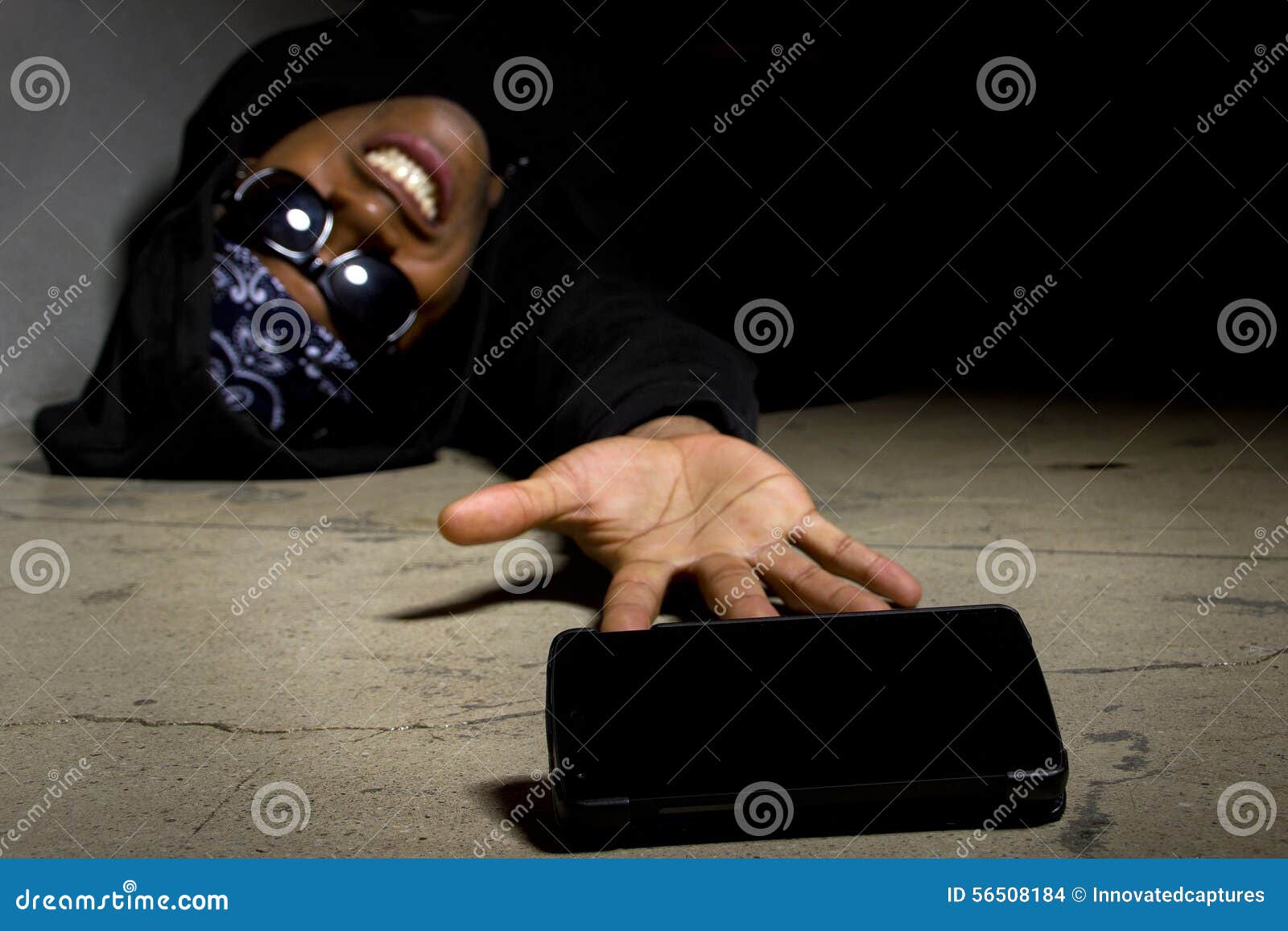 Gangster Calling for Help stock photo. Image of laying - 56508184