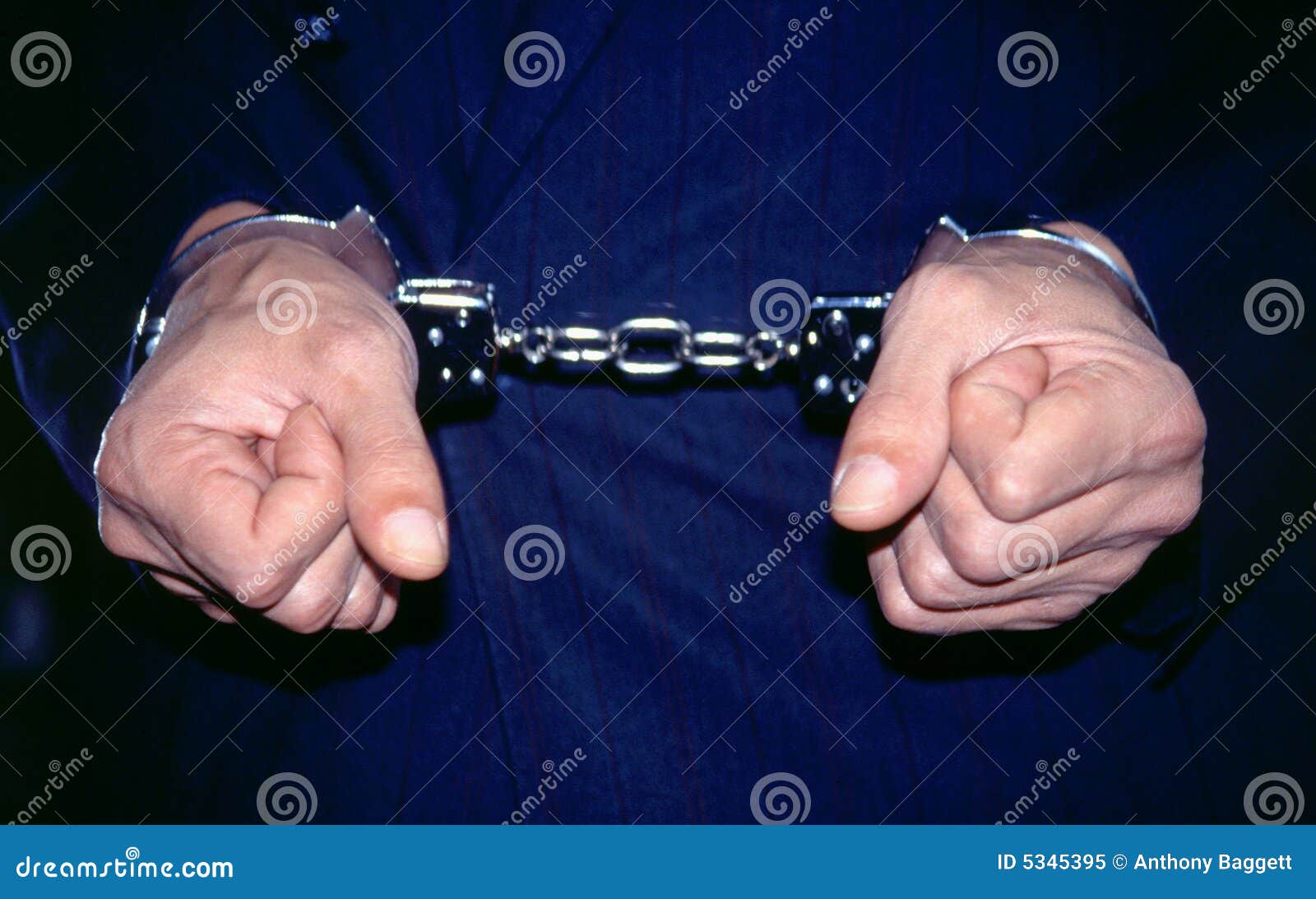 Gangster in Handcuffs stock image. Image of corporate - 5345395