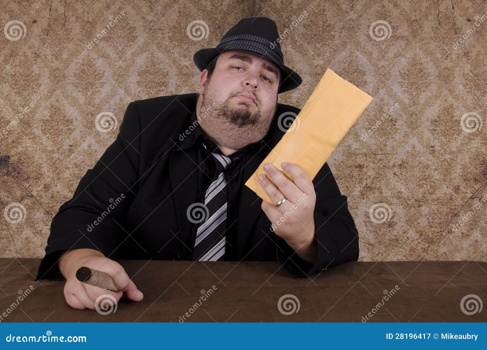 Gangster Holding Brown Envelope Stock Image - Image of payday, cash ...
