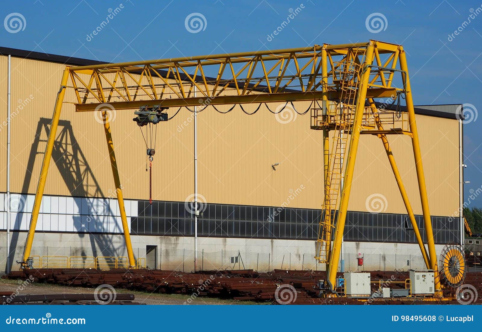 Gantry Crane and Its Shadow on the Factory Wall. Stock Photo - Image of ...