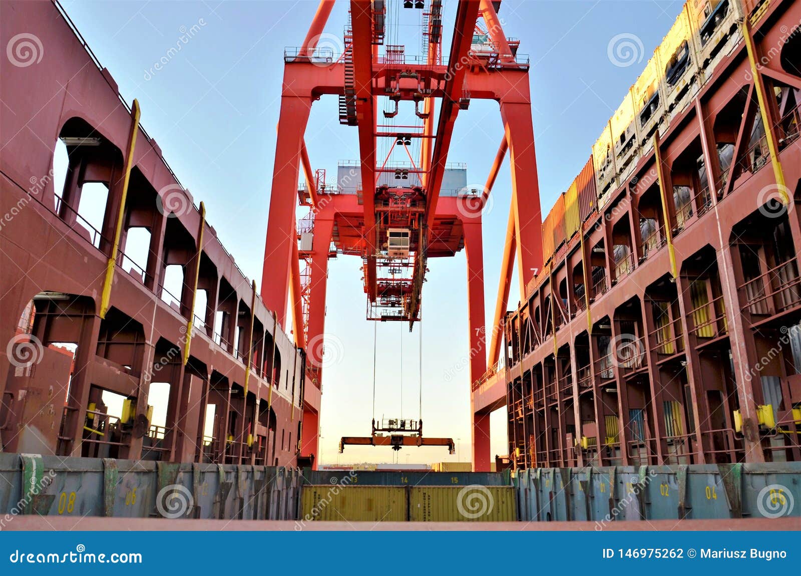 Gantry Crane Loading Containers on the Cargo Ship. Stock Photo - Image ... Gantry Crane Loading Containers on the Cargo Ship. Stock Photo - Image ...