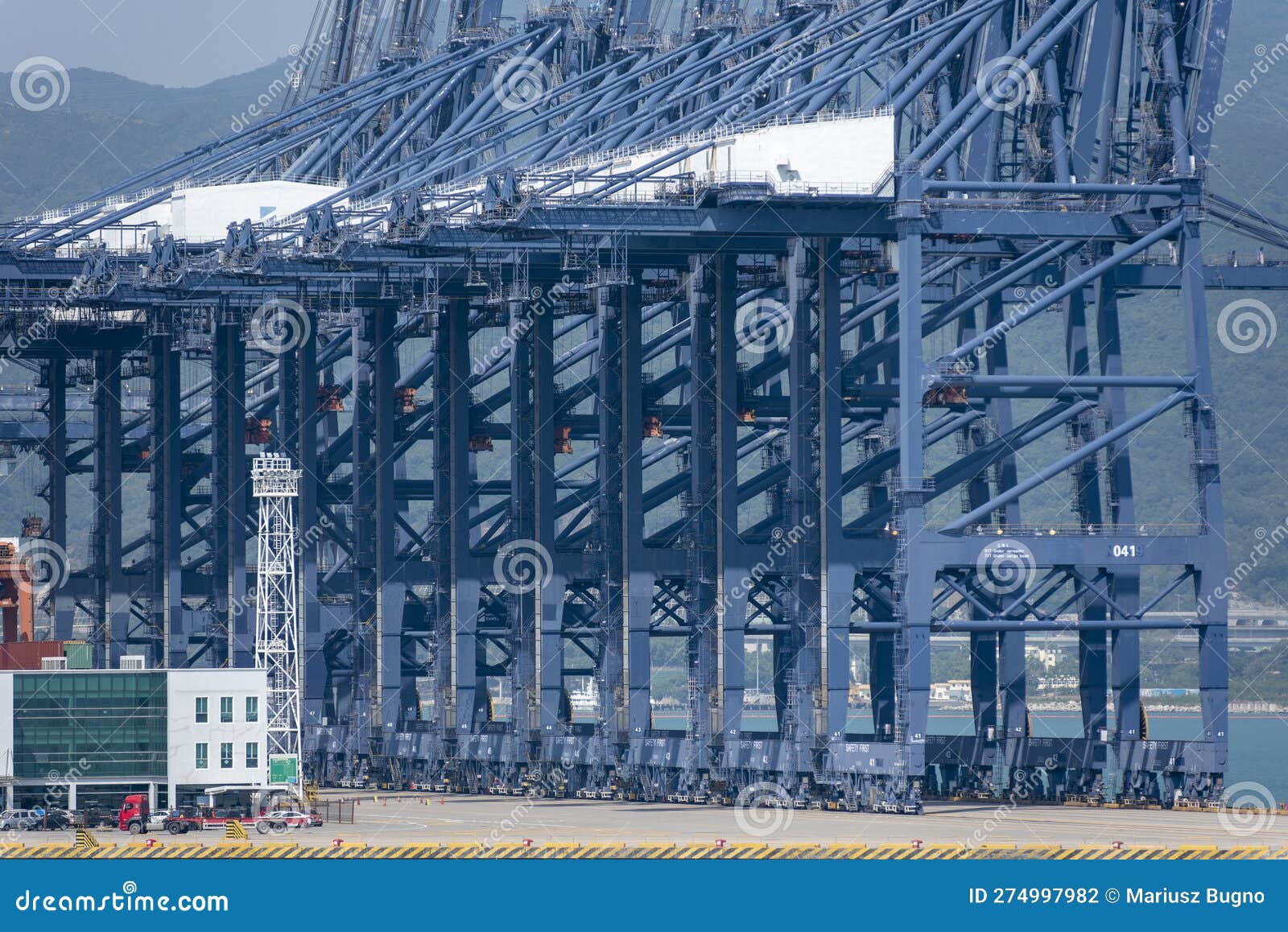Gantry Cranes in the Container Terminal, Ready for Cargo Operation ...
