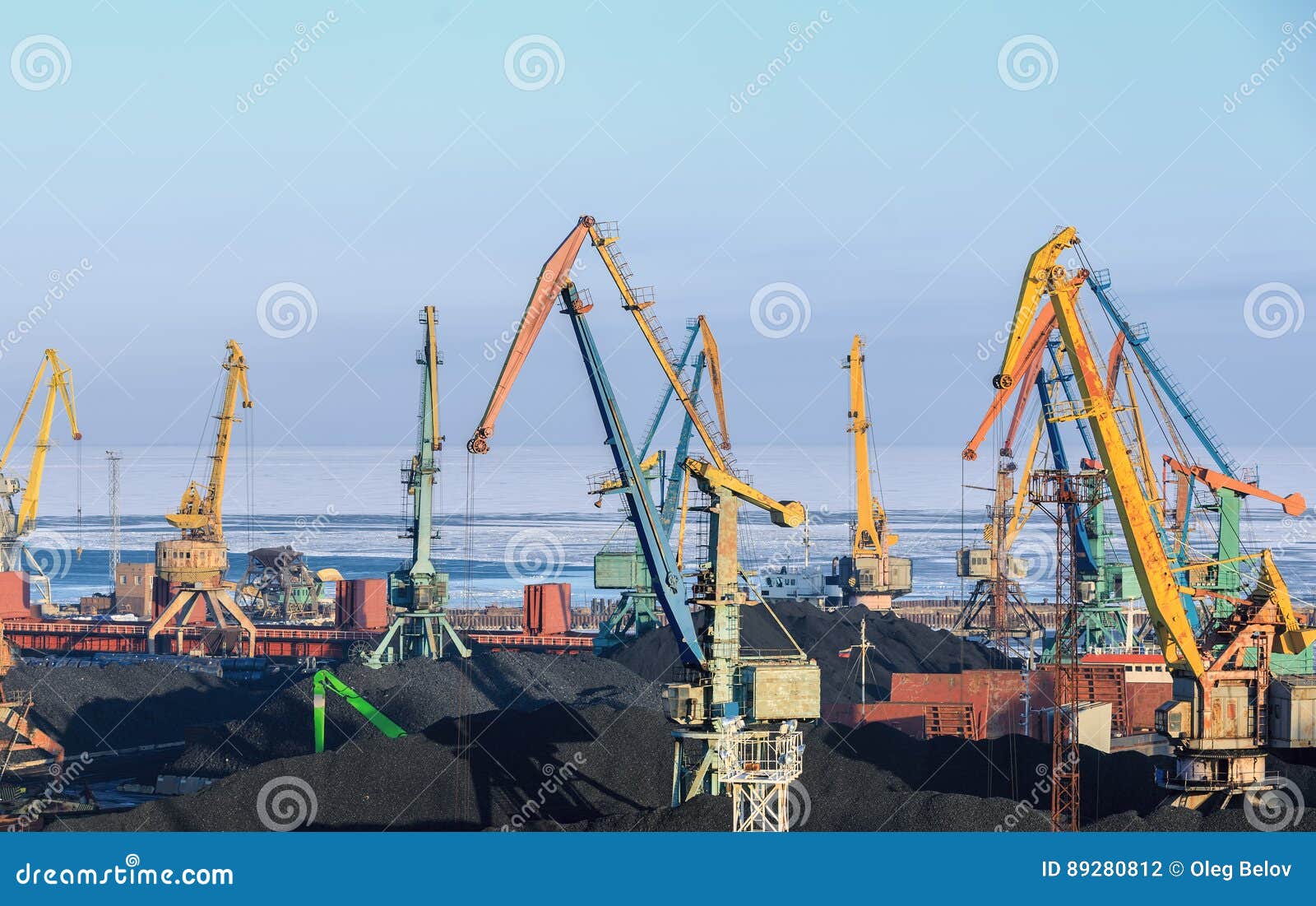 Gantry Cranes is Overloading the Coal in the Port on Ships. Stock Photo ...