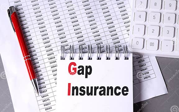 GAP INSURANCE Text on Notebook with Chart , Pen and Calculator Stock ...