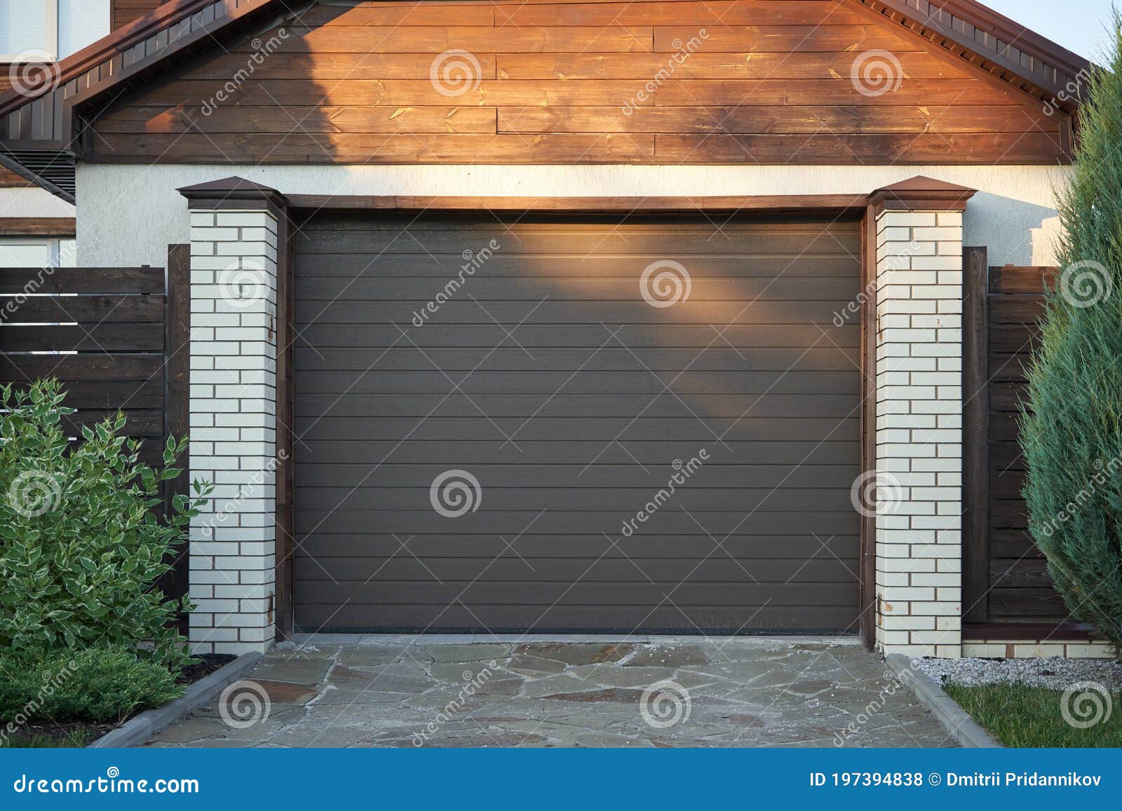 A Garage and an Automatic Lift Gate, Brown Stock Photo - Image of ...