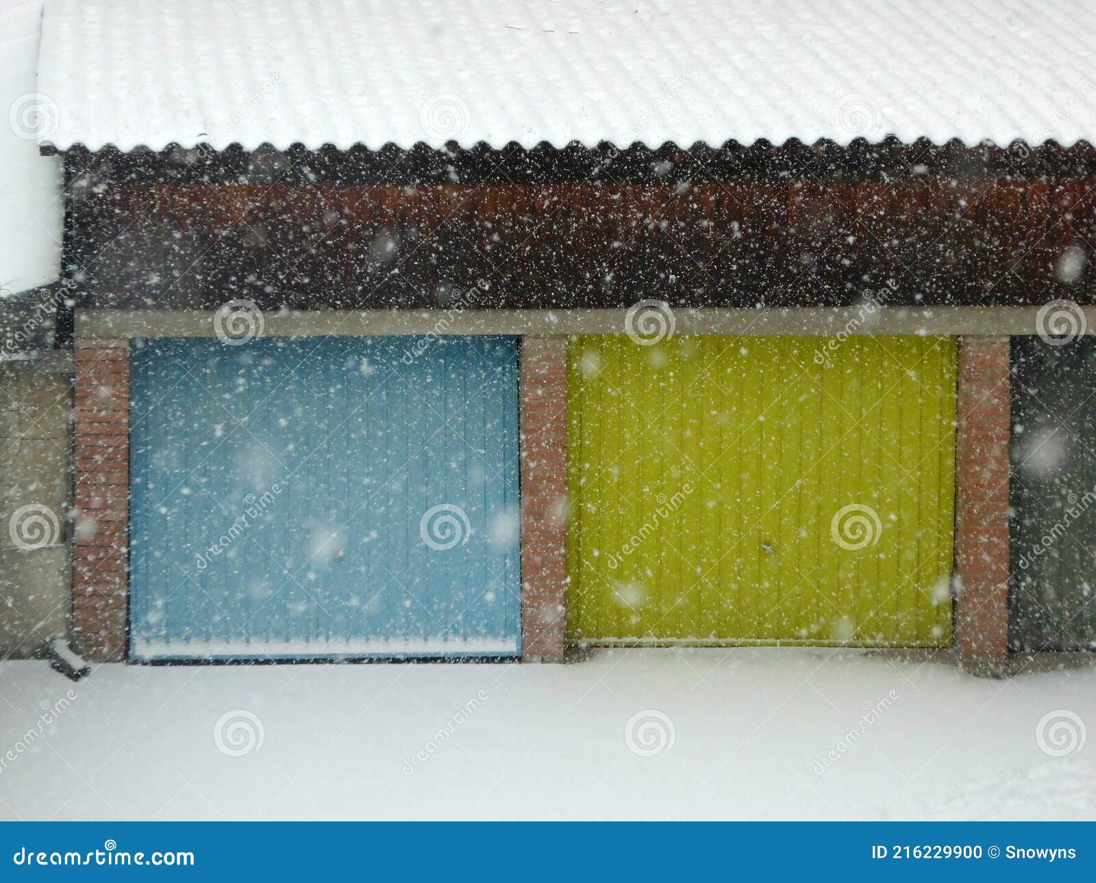 Garage Door and Snow in Front of it Covered with Snow Stock Photo ...